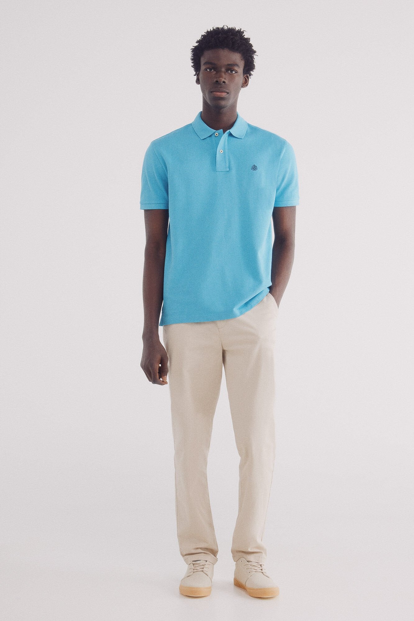 Turquoise Polo|Essential regular fit piqué polo shirt|Springfield ...